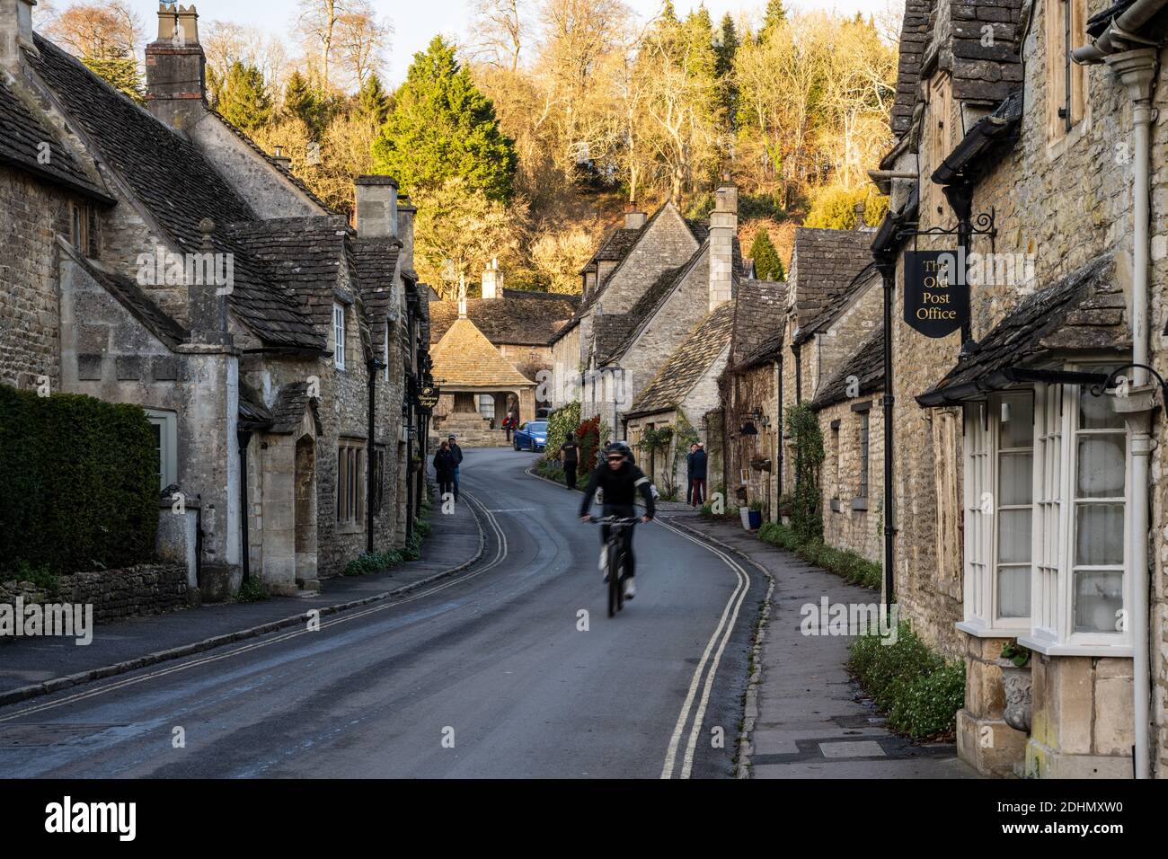 Village cotswolds street cyclist hi-res stock photography and images ...