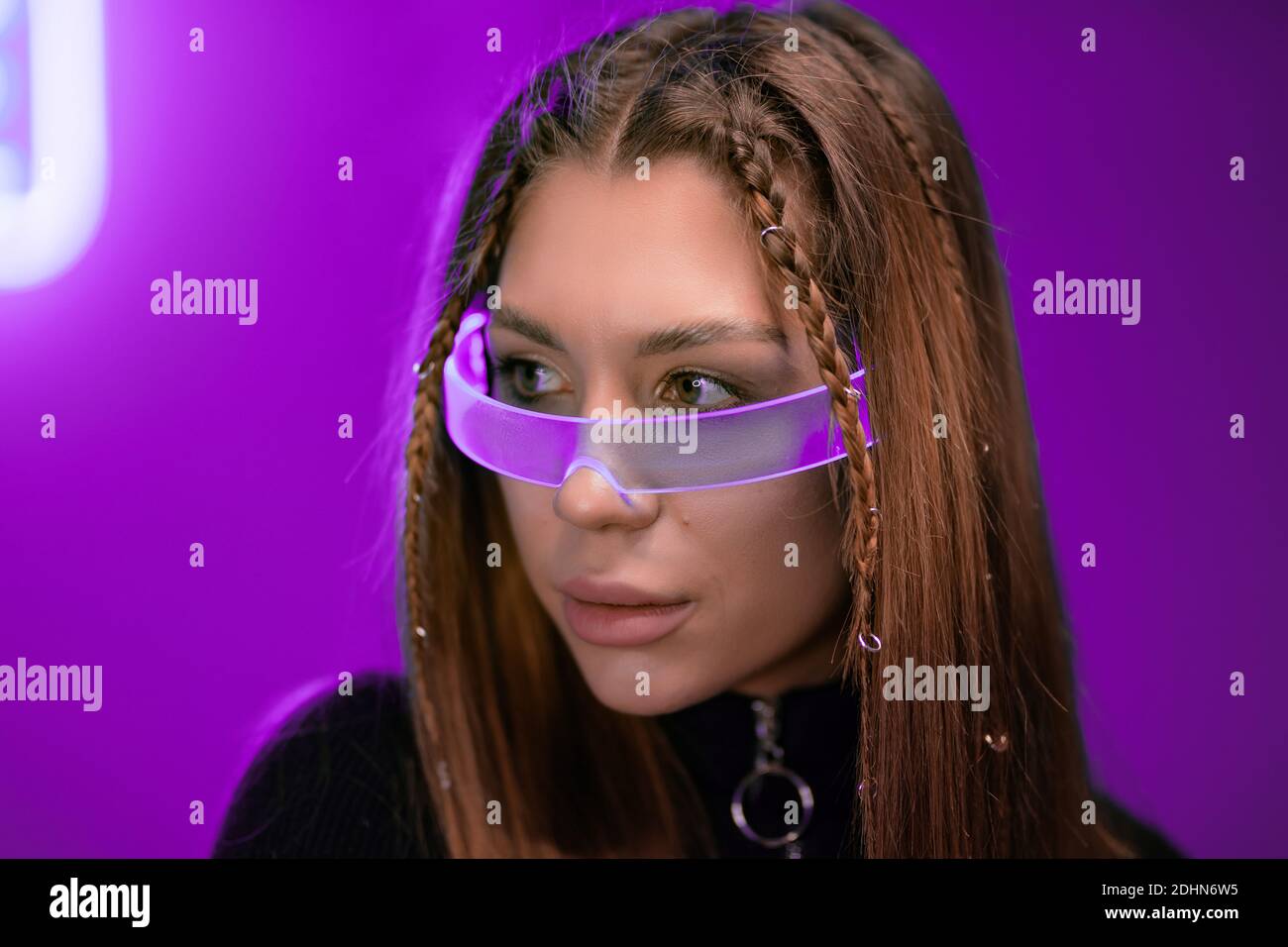 Young woman in cyber neon glasses. Cyberpunk style Stock Photo - Alamy