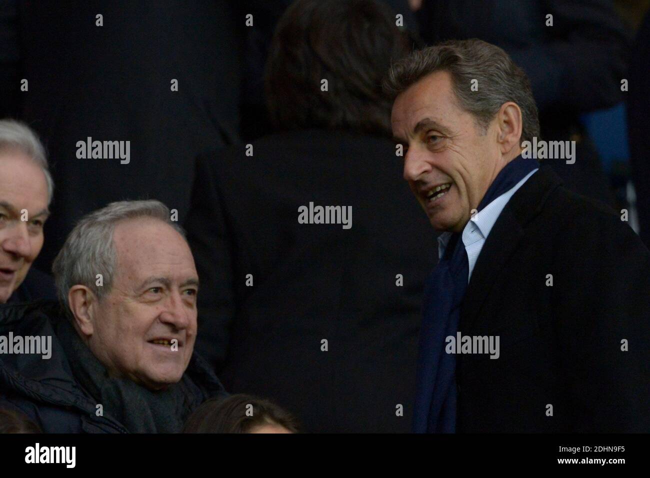Jean Tiberi and Nicolas Sarkozy in the stands attending the French ...