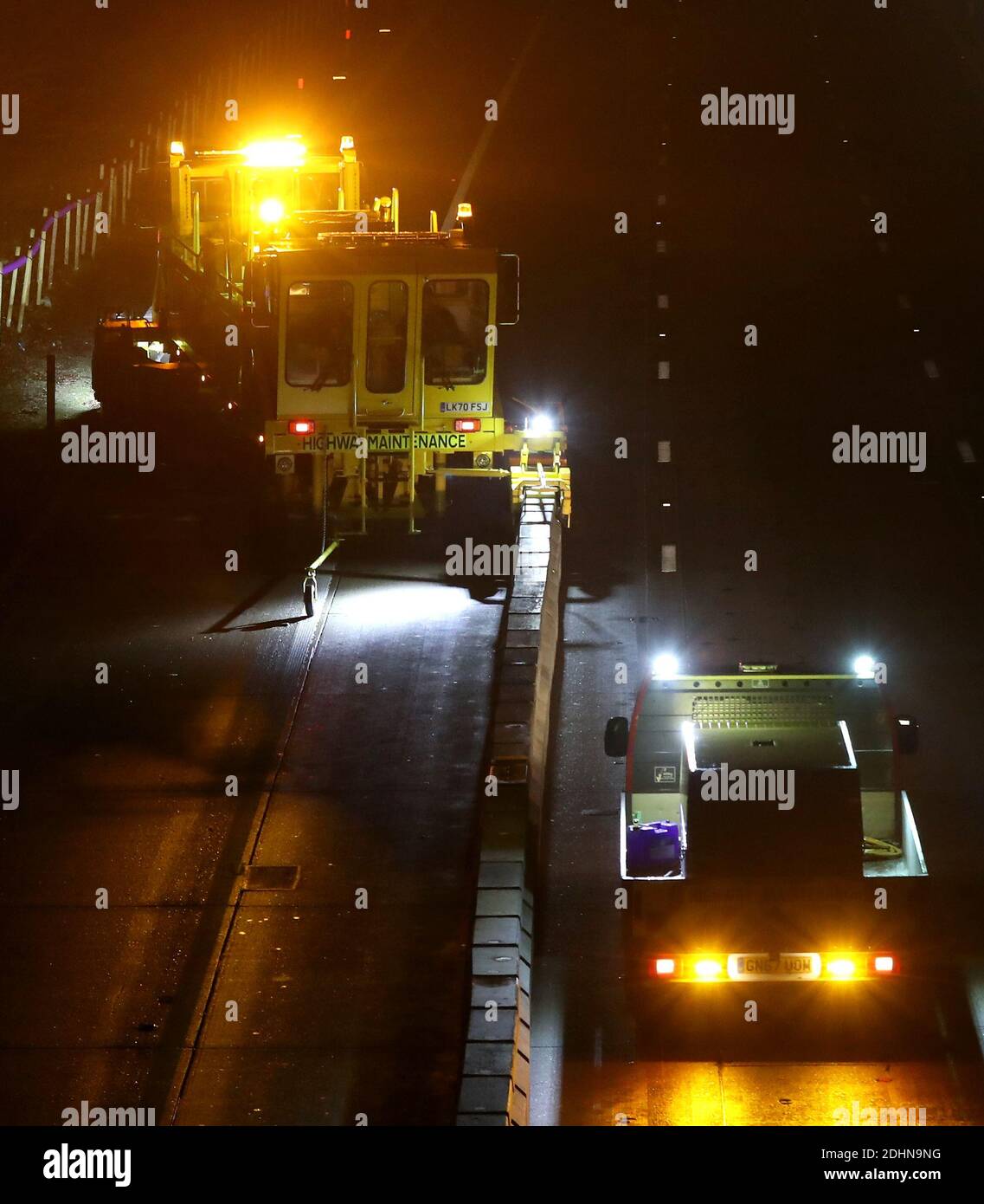 A moveable barrier system is lifted into place on a section of the M20 ...
