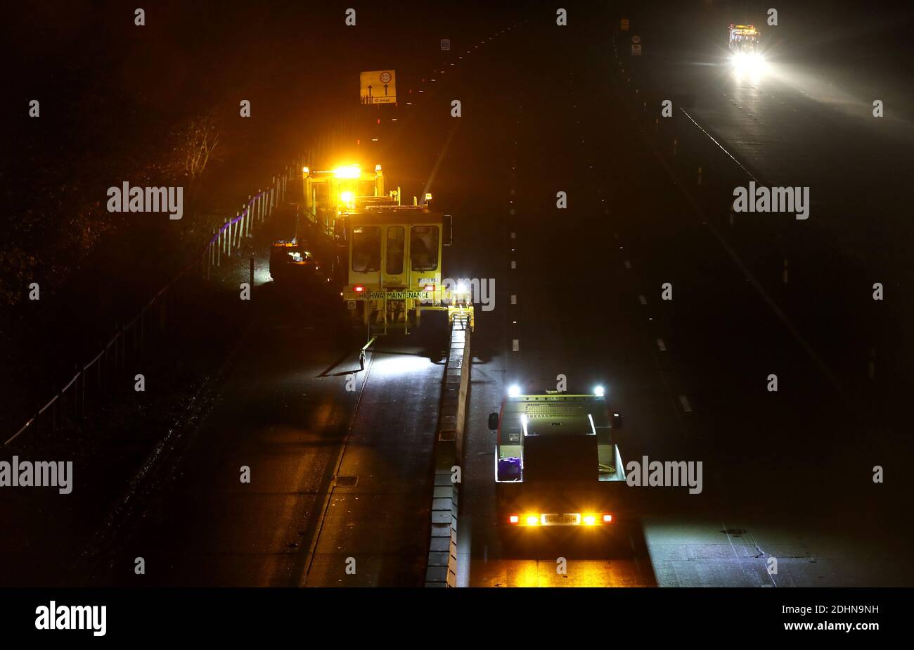 A moveable barrier system is lifted into place on a section of the M20 ...