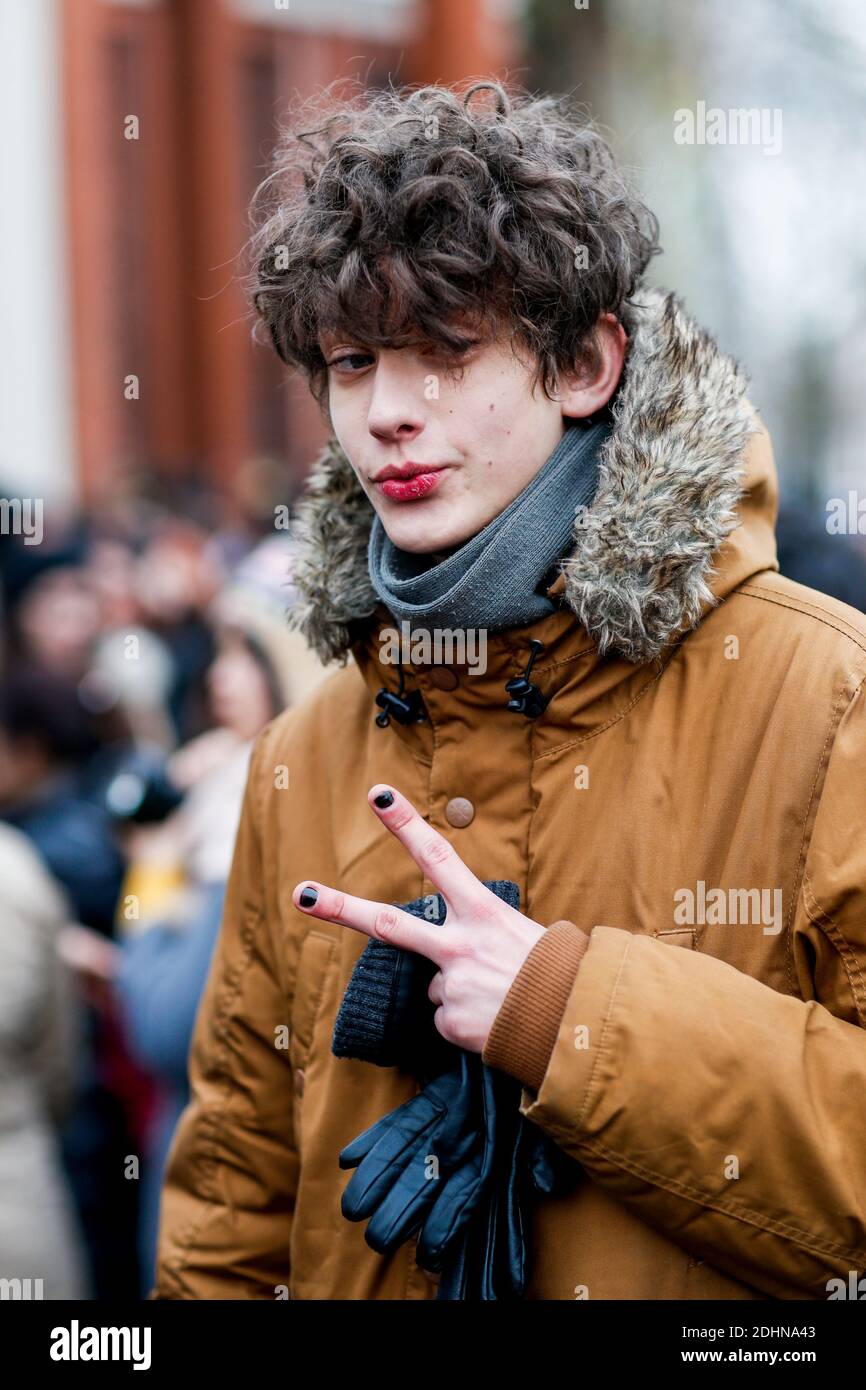 Street style, model after Dior Fall-Winter 2016-2017 menswear show held ...