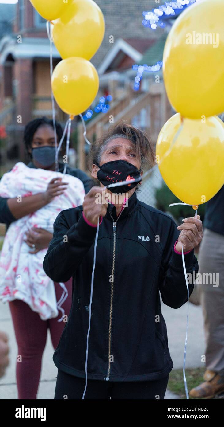 Chicago, Illinois, USA. 11th Dec, 2020. Sheila Wilson holds back tears ...