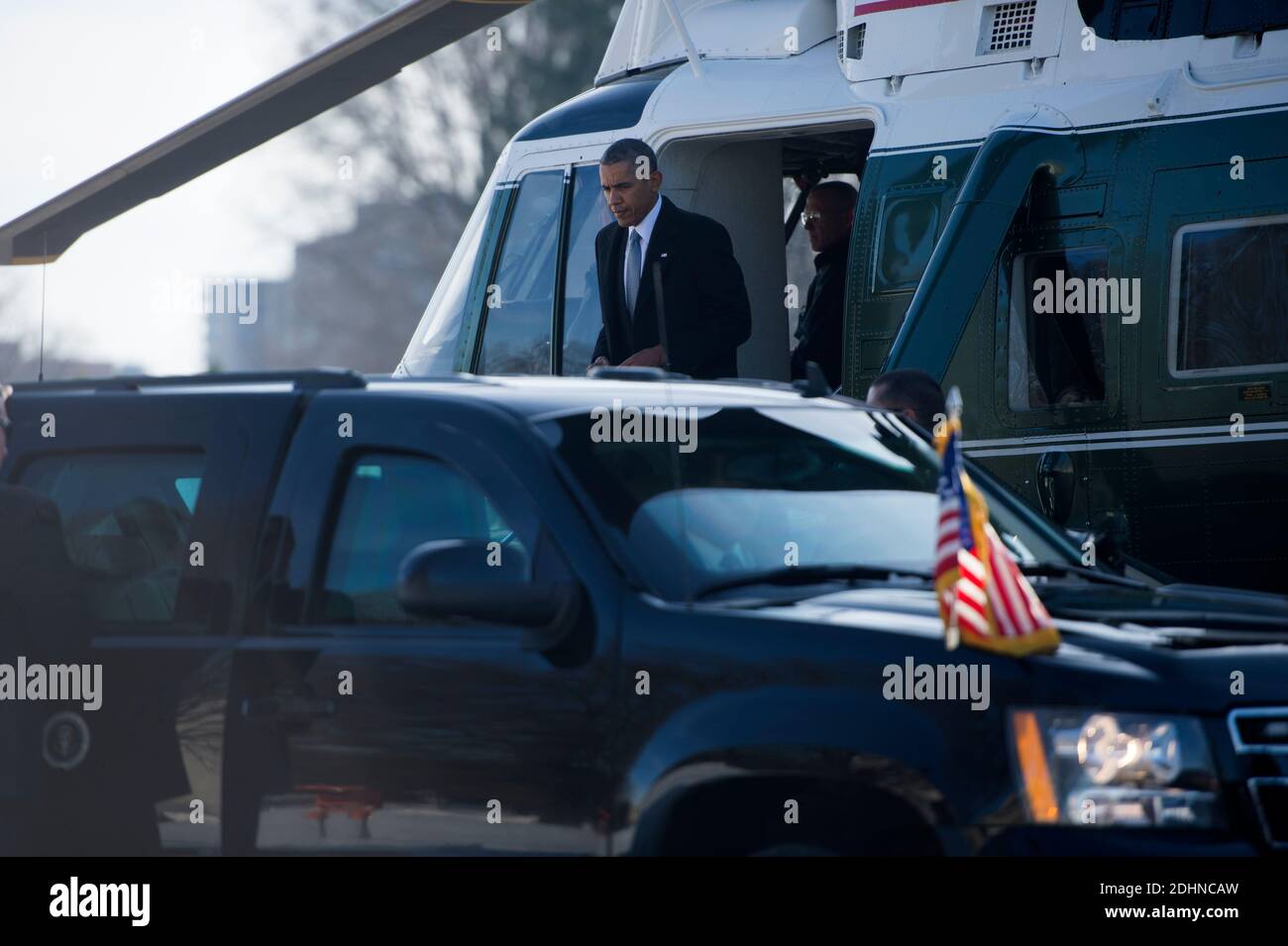 US President Barack Obama steps off Marine One at Walter Reed National ...