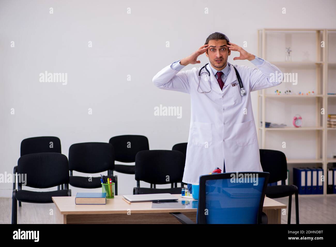Young doctor giving seminar in the classroom Stock Photo - Alamy