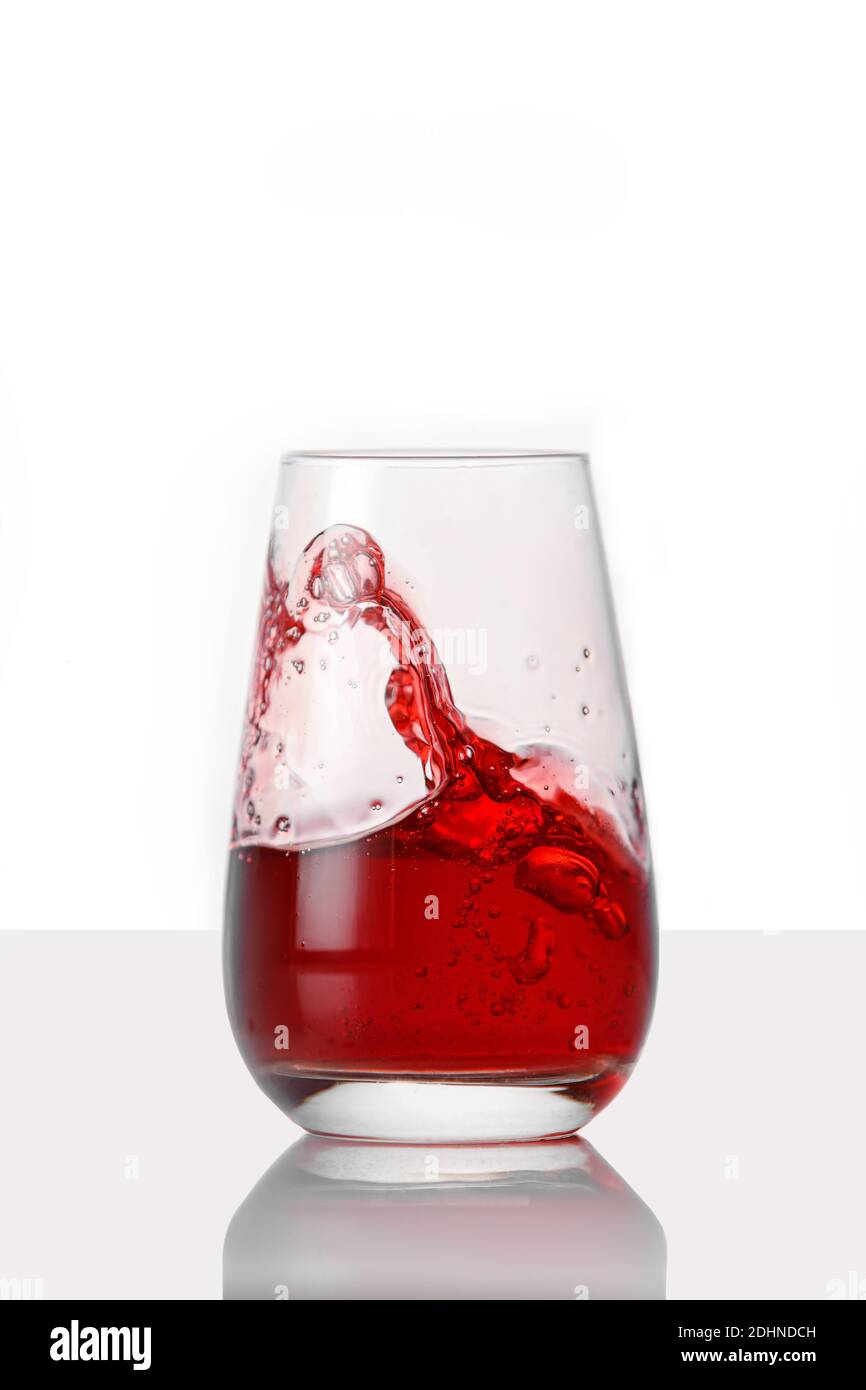 Red juice splashes on isolated white background Stock Photo - Alamy