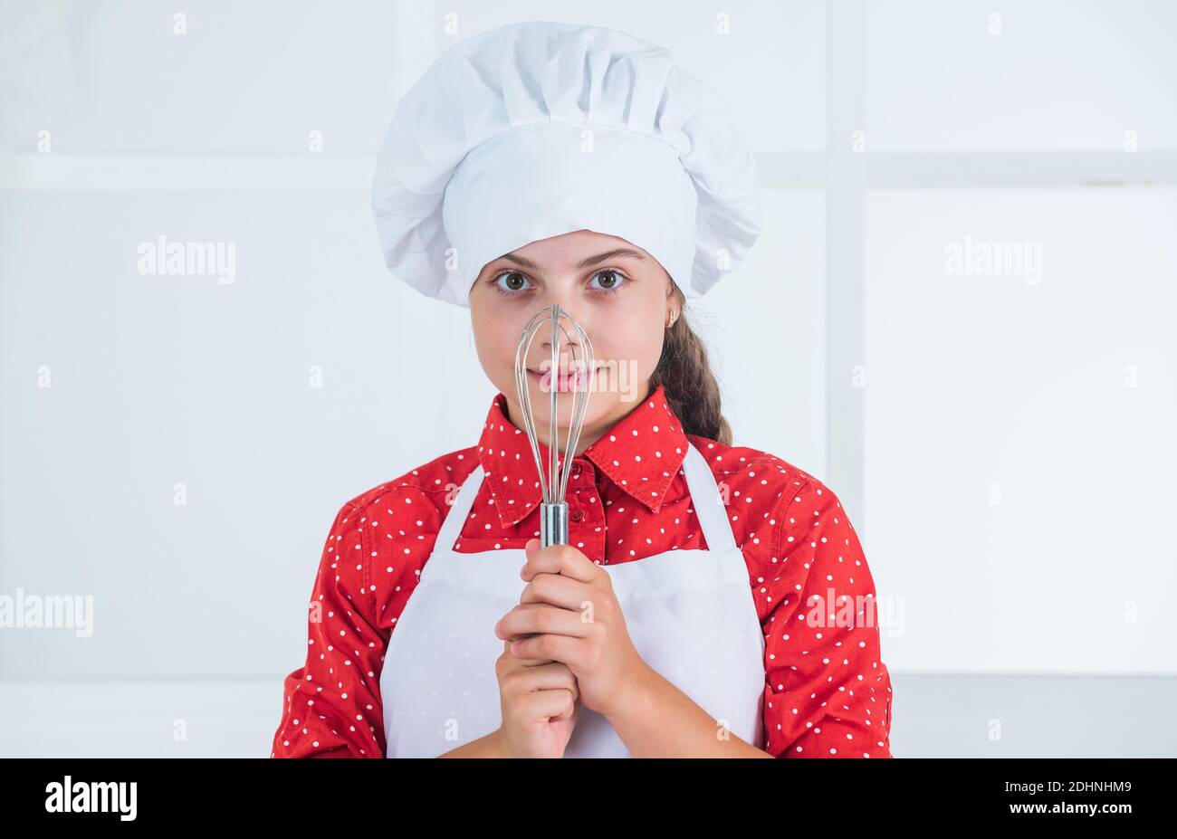 using beater for cooking. culinary school. traditional cuisine. kid ...