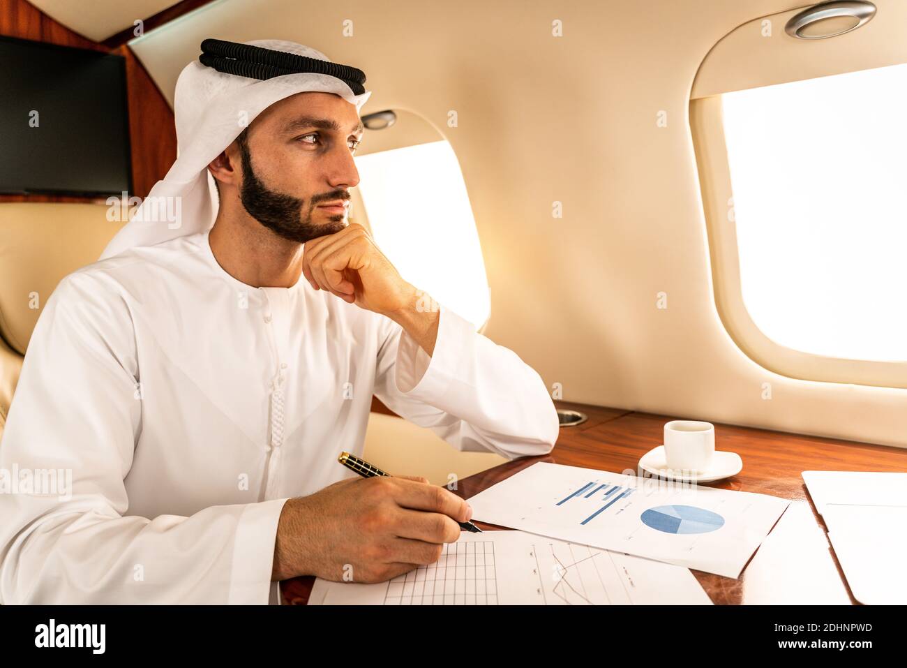 Arabic man wearing kandora in emirates style flying on exclusive ...