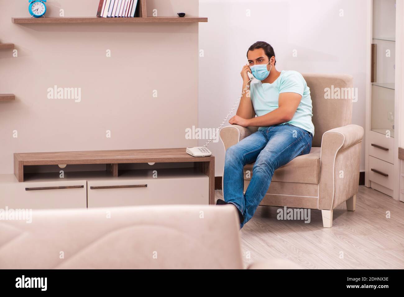 Young man student boring at home during pandemic Stock Photo - Alamy