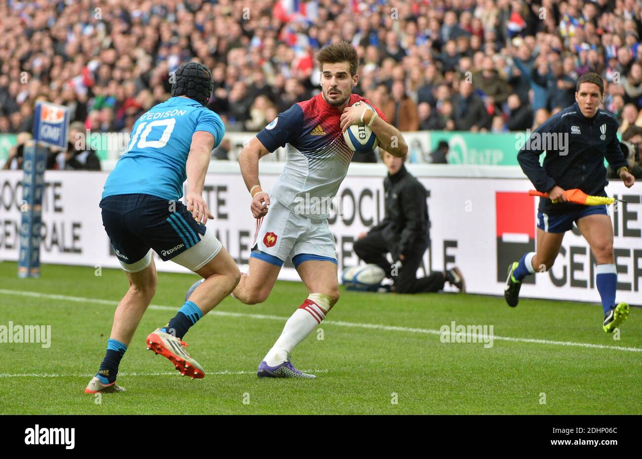 France's wing Hugo Bonneval (L) scores a try during the Six Nations ...