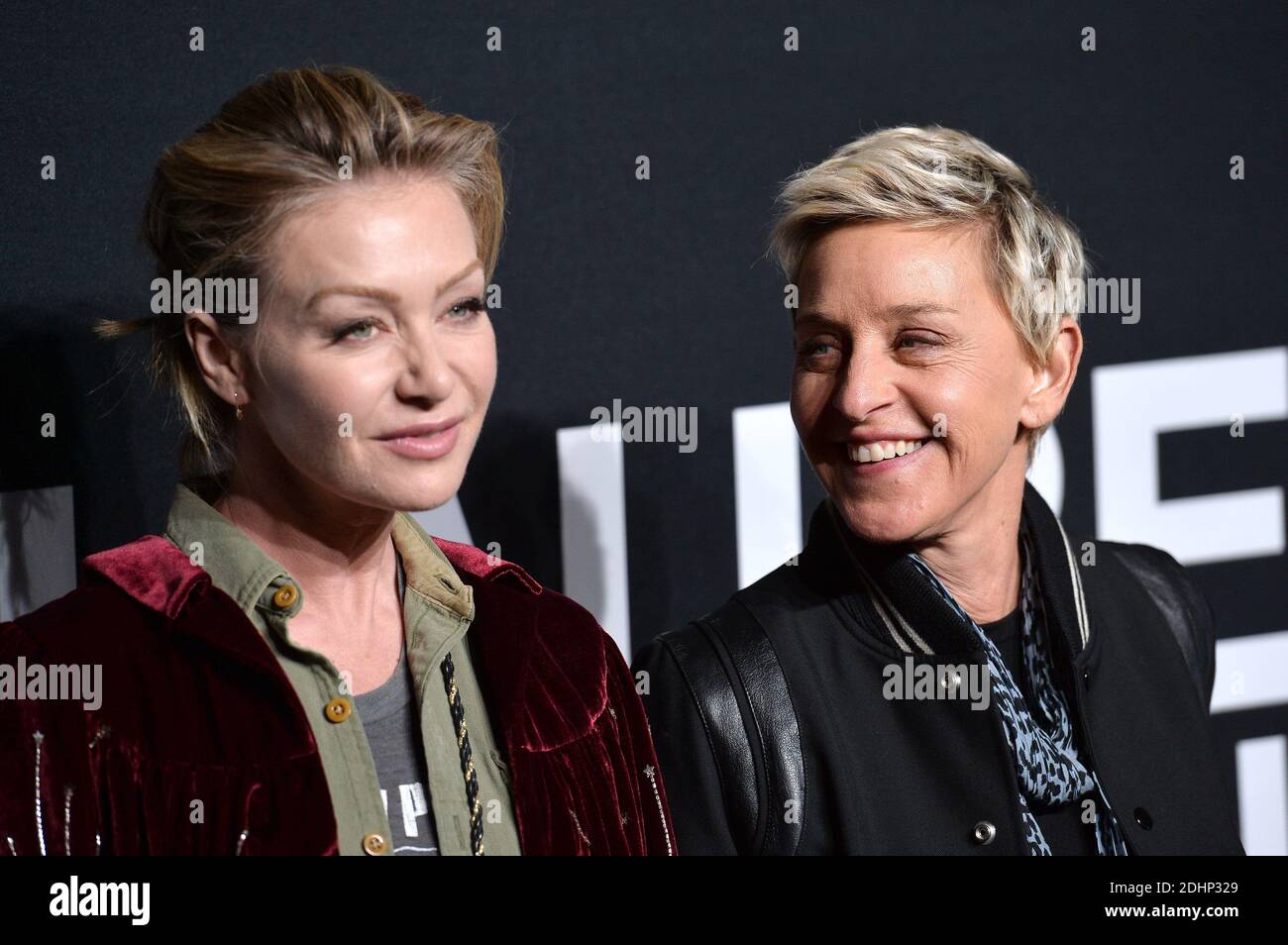 Portia de Rossi and Ellen DeGeneres attend the Saint Laurent show at ...
