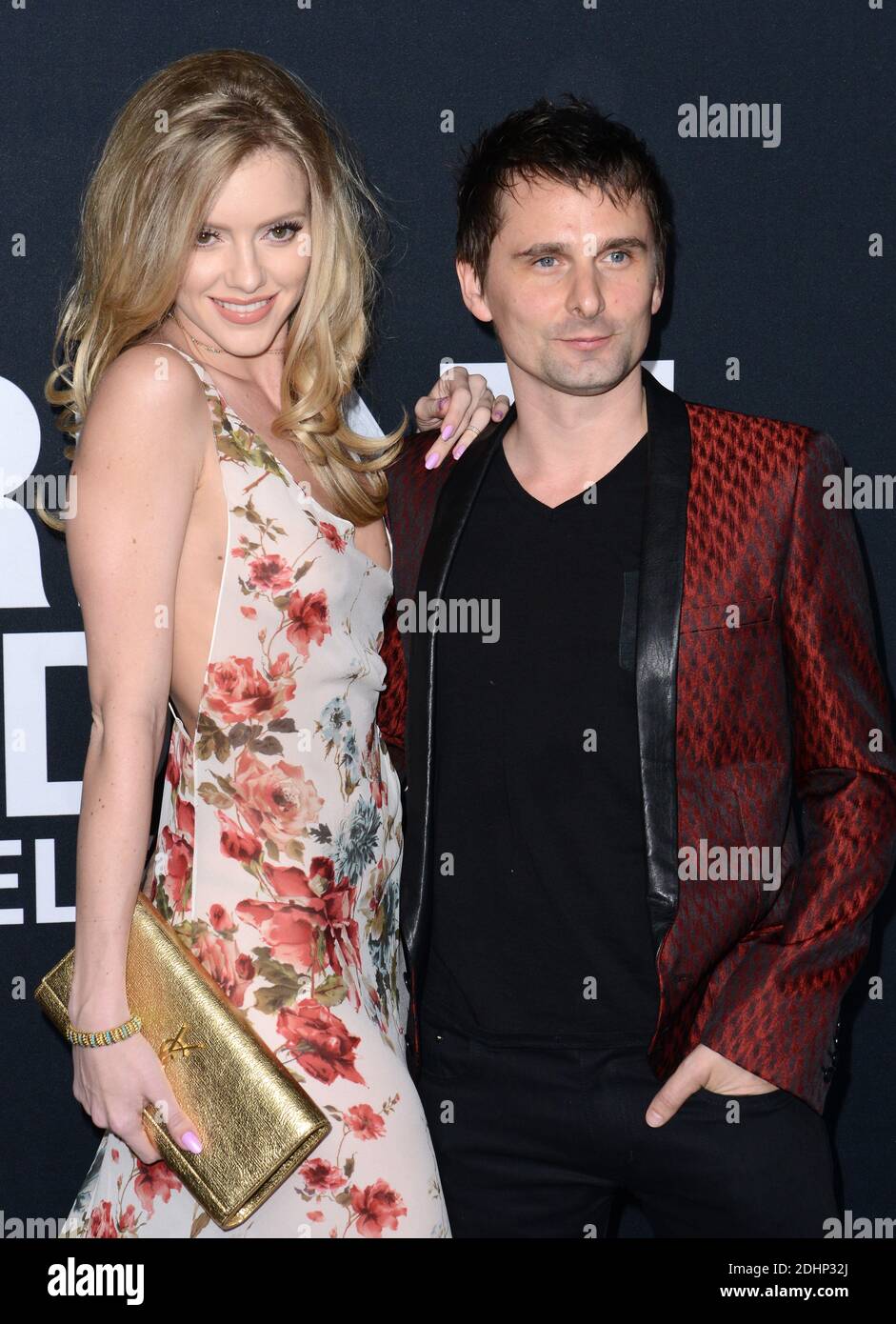 Elle Evans and Matt Bellamy attend the Saint Laurent show at The ...