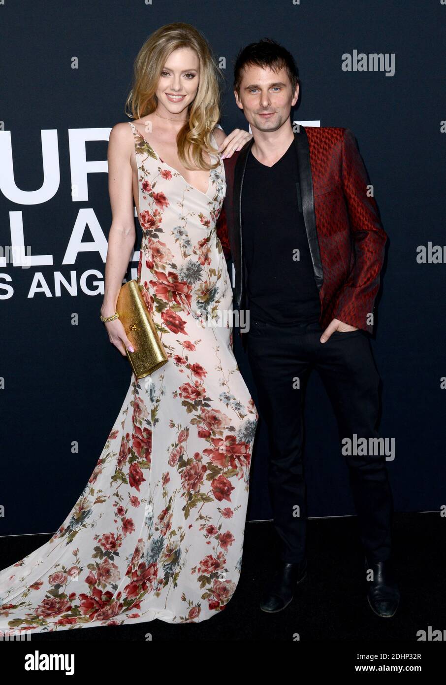 Elle Evans and Matt Bellamy attend the Saint Laurent show at The ...