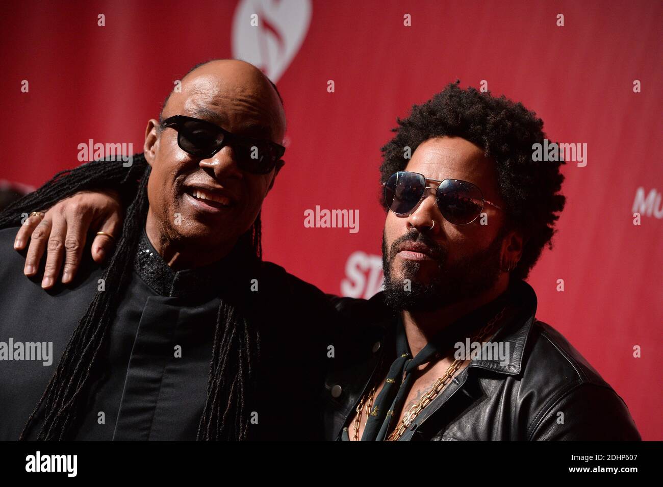 Lenny Kravitz and Stevie Wonder attend the MusiCares Person of the Year ...