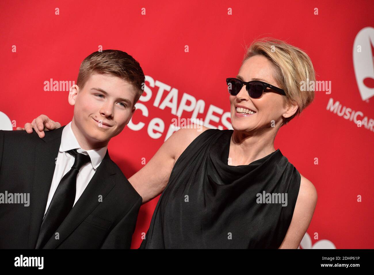 Roan Bronstein and Sharon Stone attend the MusiCares Person of the Year ...
