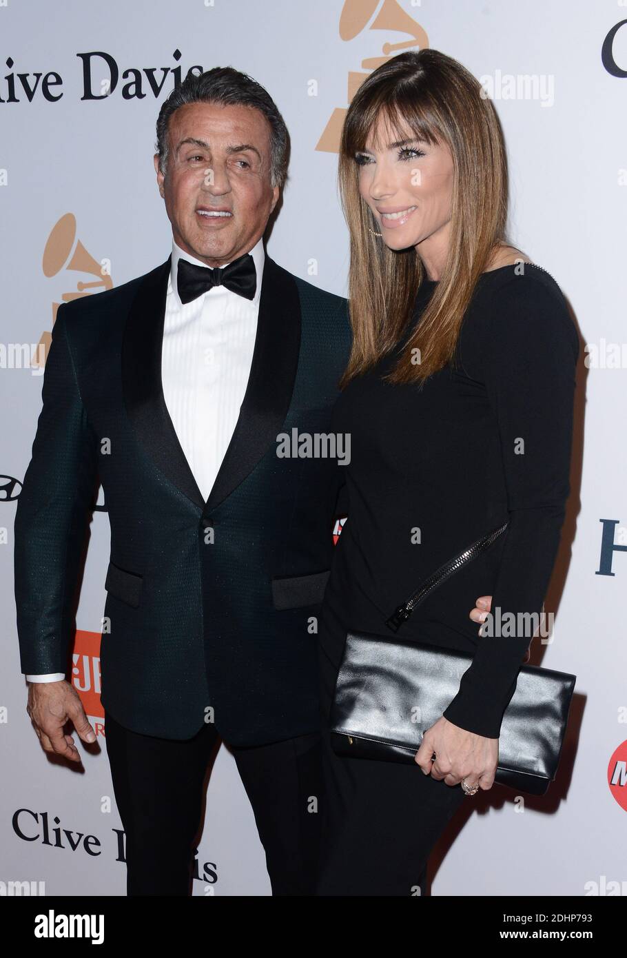 Sylvester Stallone and Jennifer Flavin attend the 2016 Pre-GRAMMY Gala ...