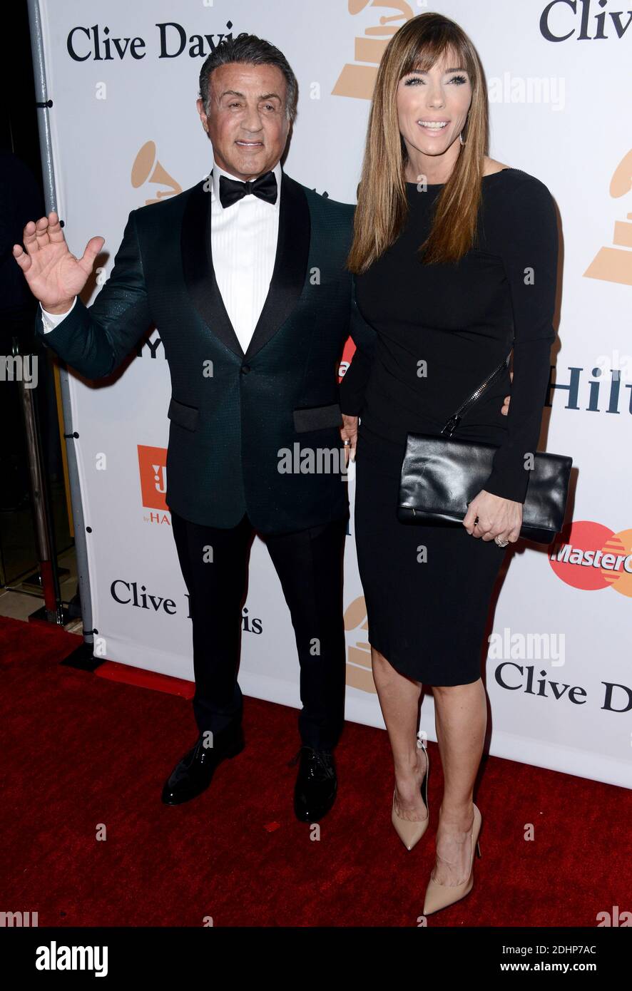 Sylvester Stallone and Jennifer Flavin attend the 2016 Pre-GRAMMY Gala ...