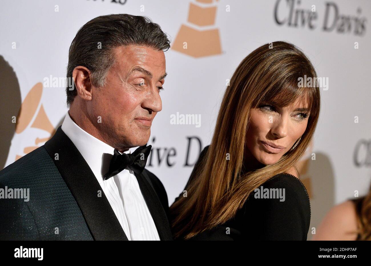 Sylvester Stallone and Jennifer Flavin attend the 2016 Pre-GRAMMY Gala ...