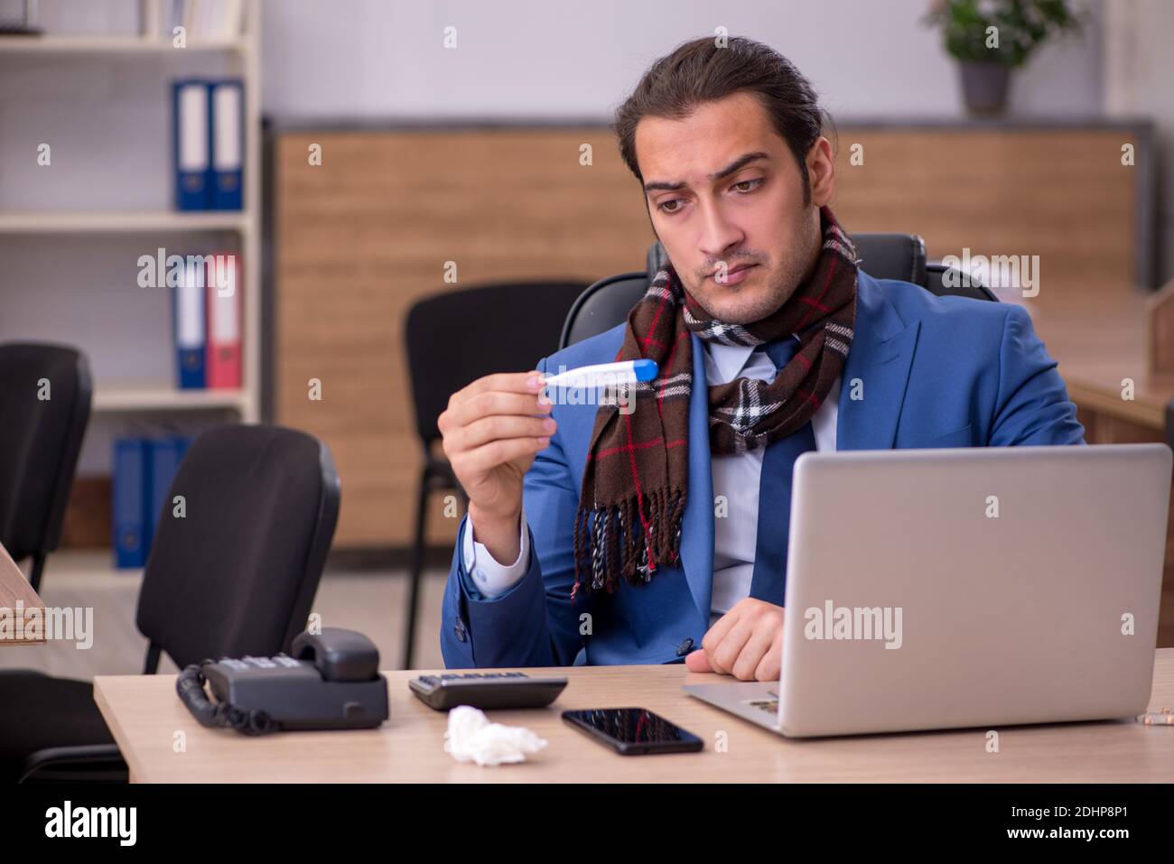 Sick businessman employee suffering at workplace Stock Photo - Alamy