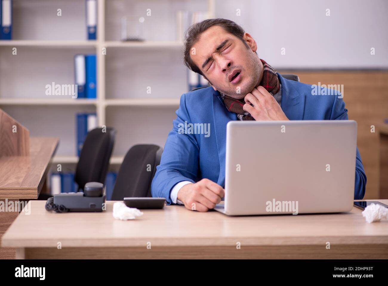 Sick businessman employee suffering at workplace Stock Photo - Alamy