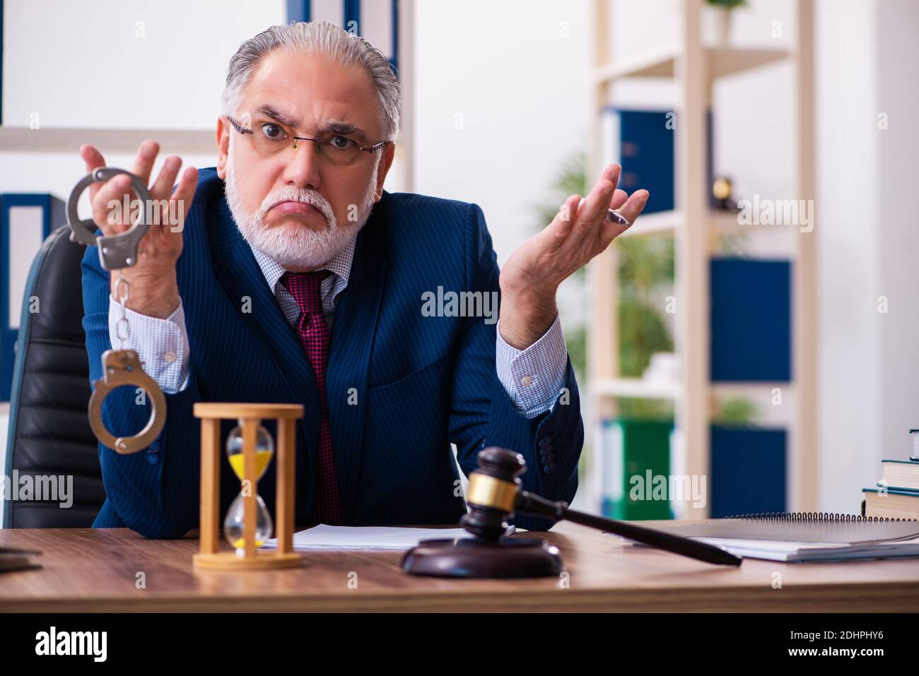 Experienced judge sitting in the office Stock Photo - Alamy