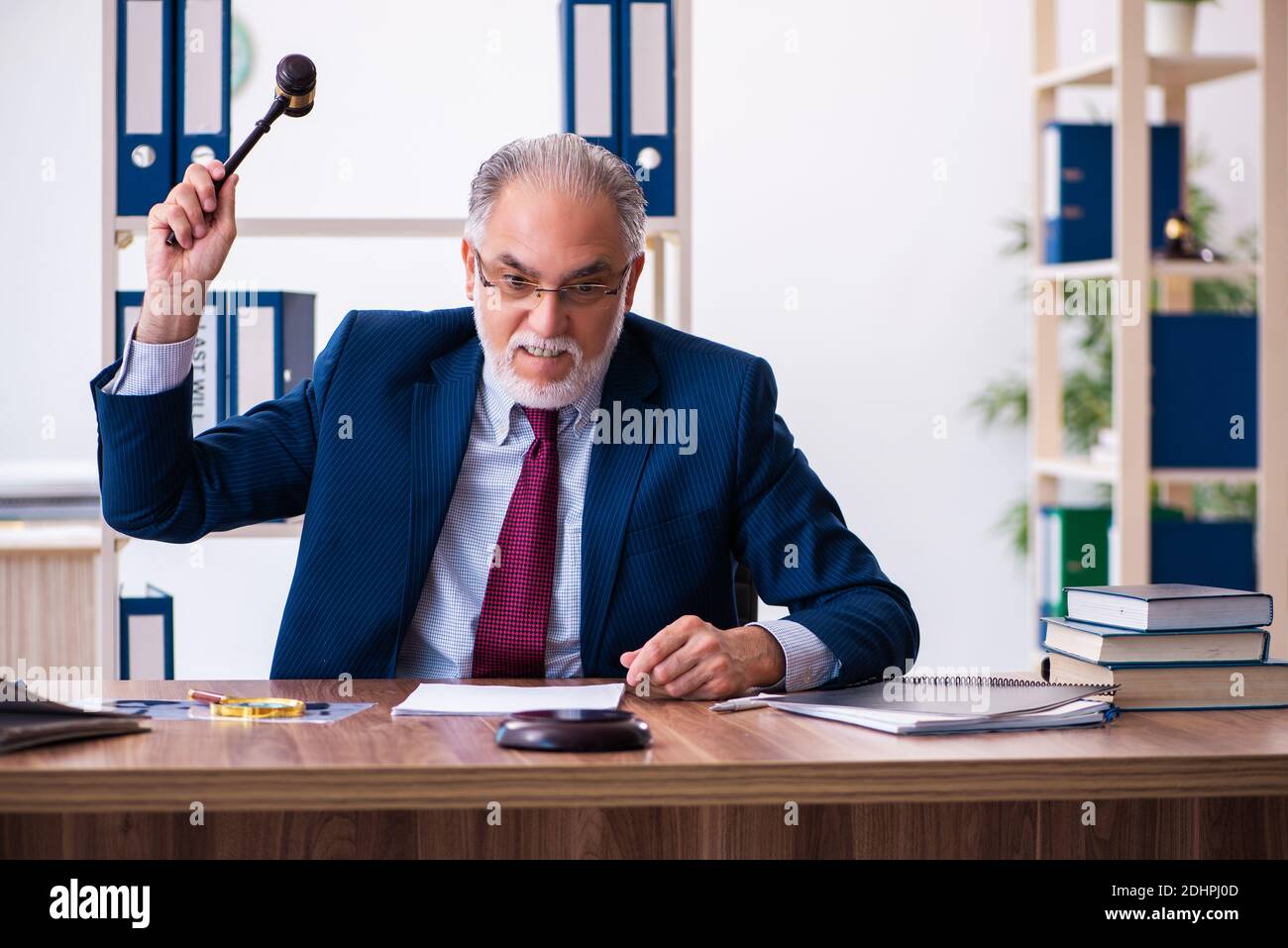 Experienced judge sitting in the office Stock Photo - Alamy