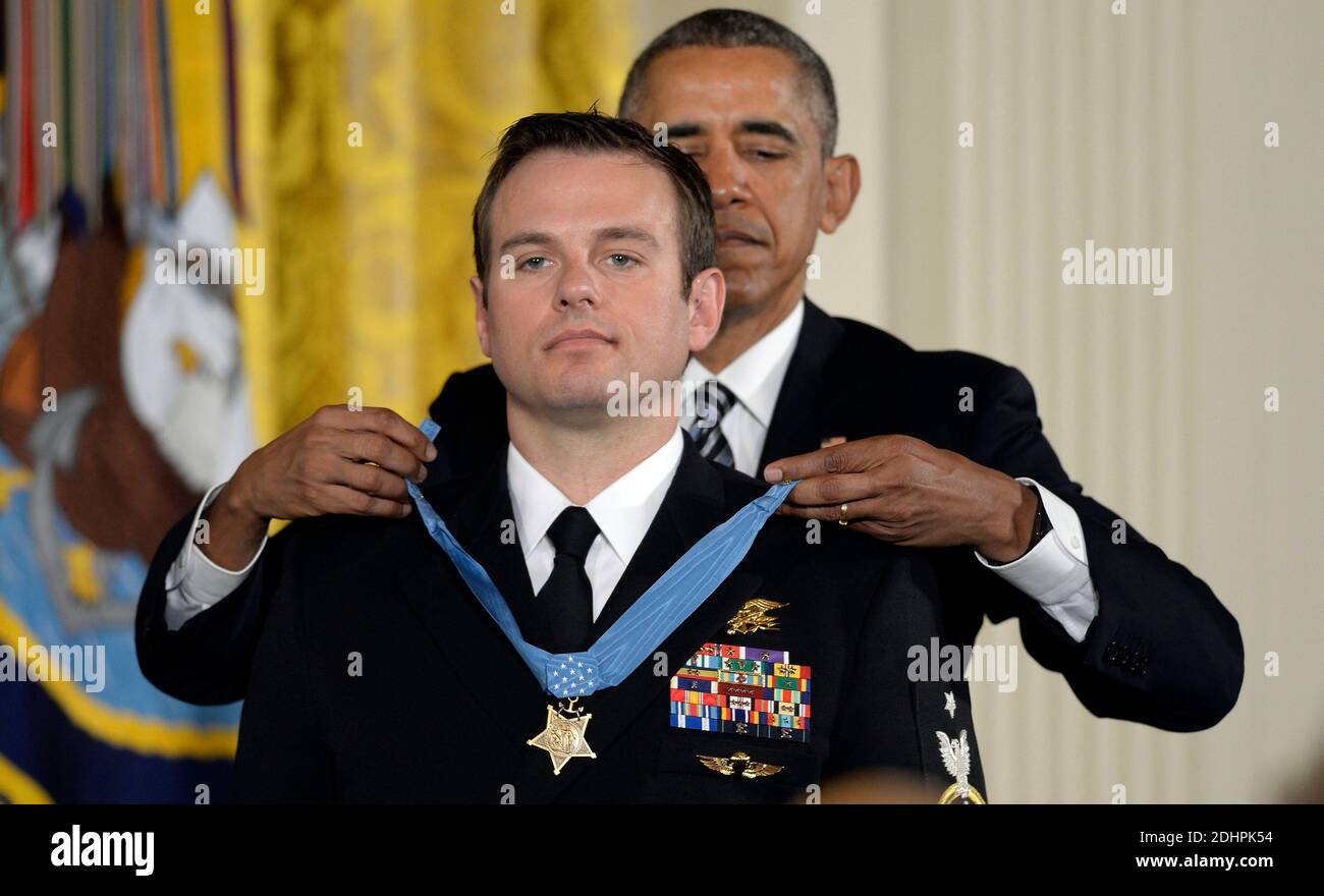 President Barack Obama presents the Medal of Honor to Senior Chief ...