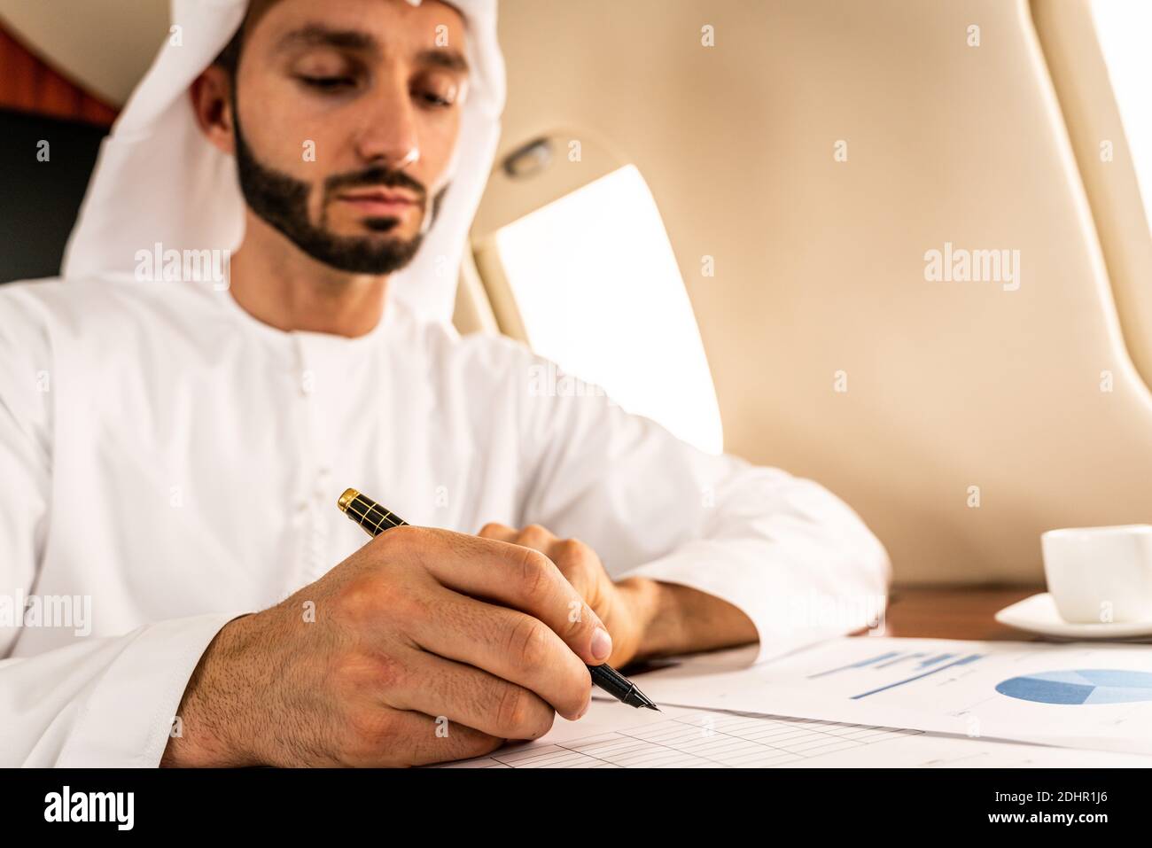 Arabic man wearing kandora in emirates style flying on exclusive ...