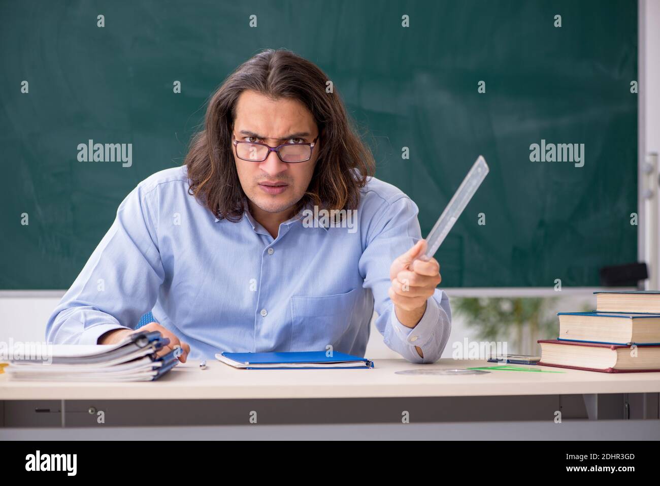 Angry teacher and ruler hi-res stock photography and images - Alamy