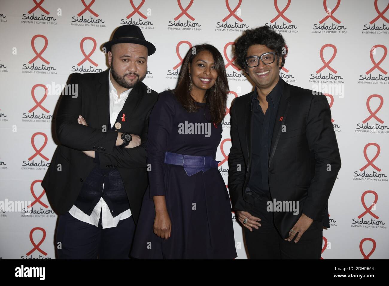 Raphal Yem, Samira Ibrahim and Sebastien Folin posing at a photocall ...