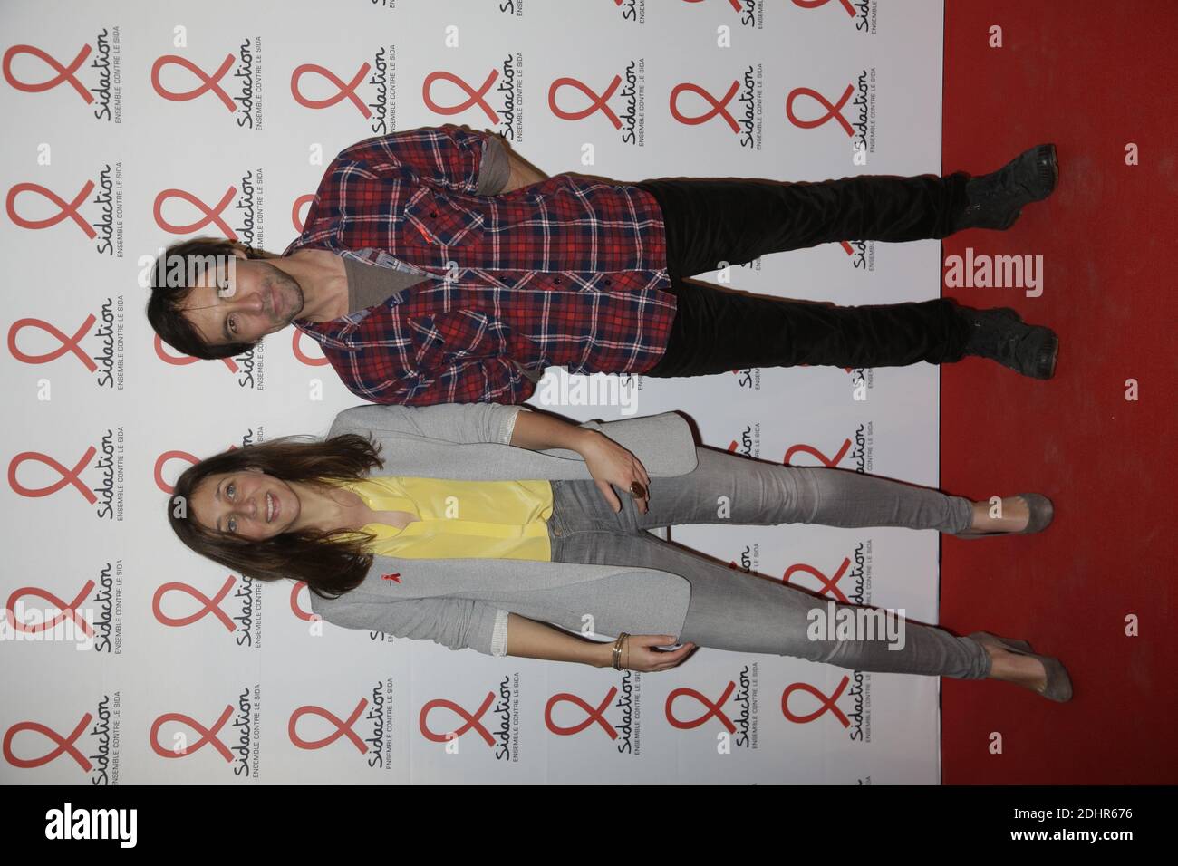 Helene Roussel and Arnaud Muller posing at a photocall for the launch ...