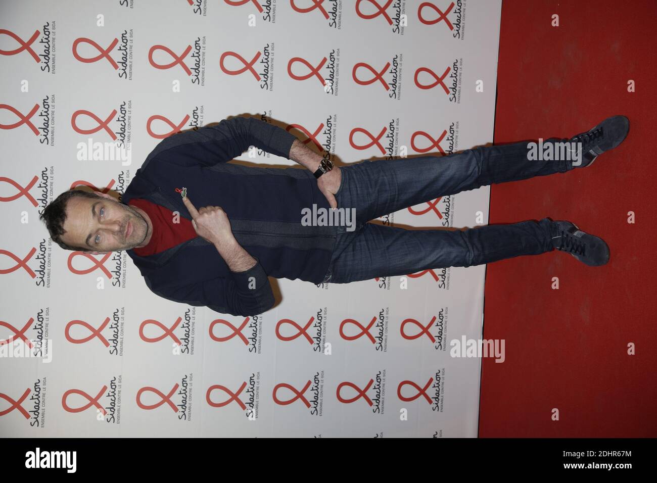 Marc-Emmanuel Dufour posing at a photocall for the launch party of the ...
