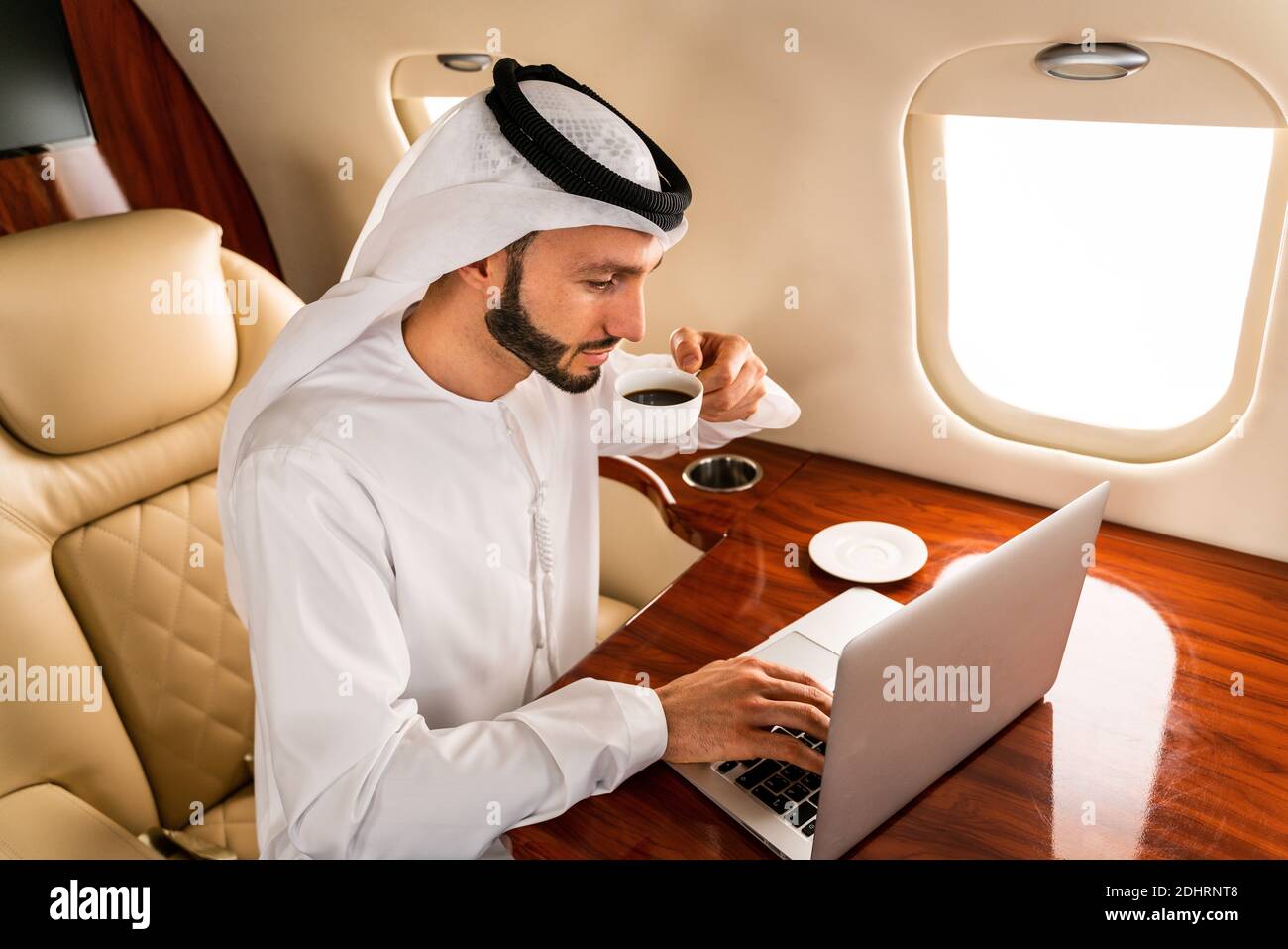 Arabic man wearing kandora in emirates style flying on exclusive ...
