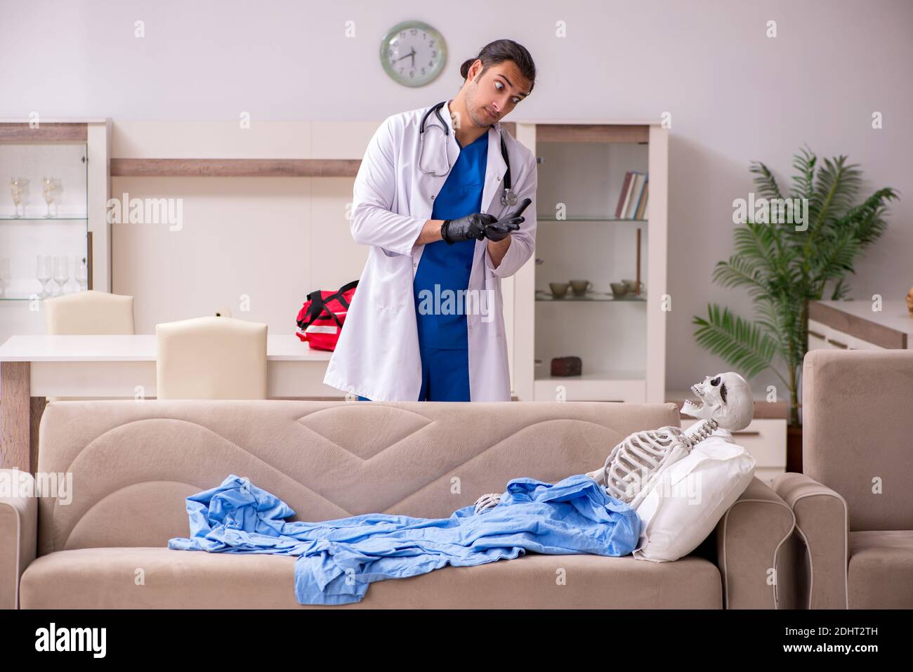 Male paramedic visiting skeleton patient Stock Photo - Alamy