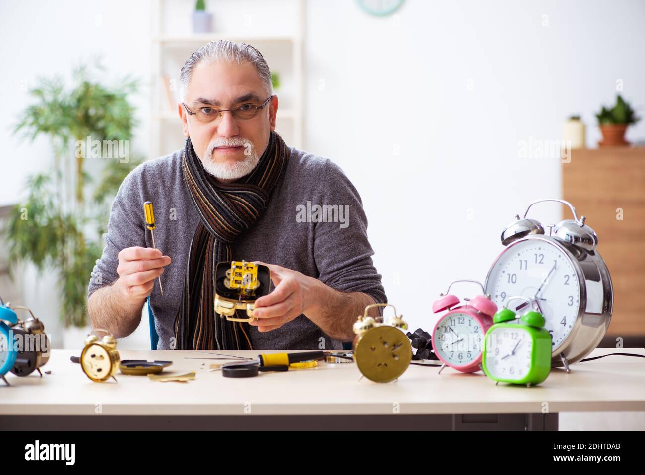 Timepiece maintenance hi-res stock photography and images - Alamy