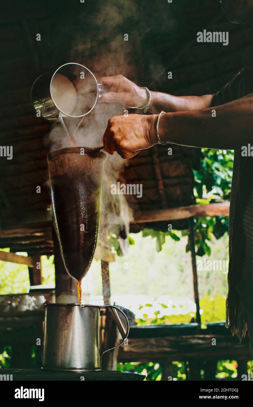 old tradition of coffee making in local of thailand Stock Photo - Alamy