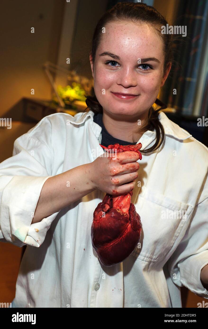 Girl with heart Stock Photo - Alamy