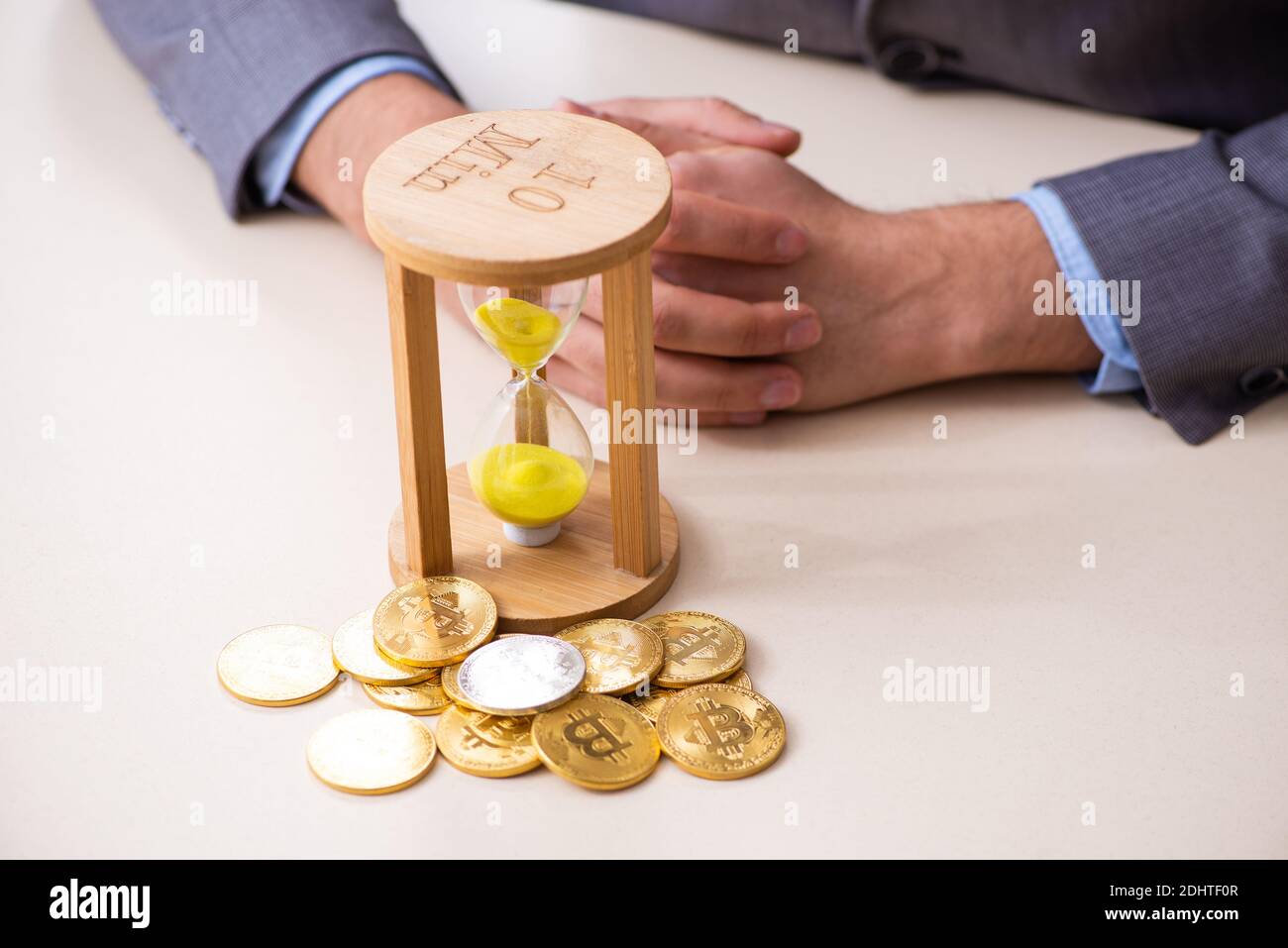 Man earning money via Internet in time management concept Stock Photo ...