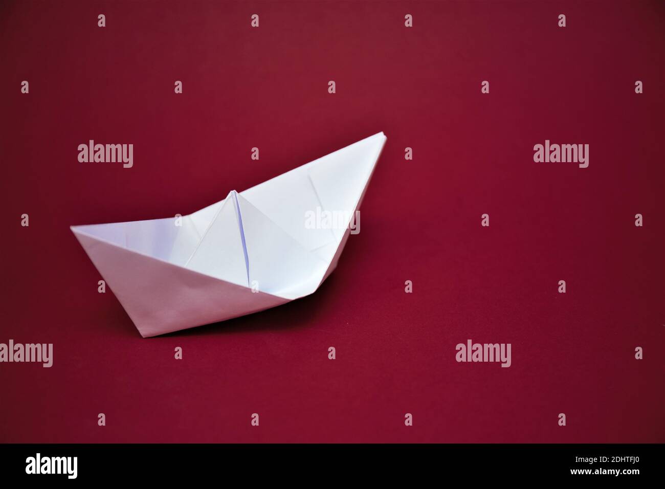 paper ship isolated on white background Stock Photo - Alamy