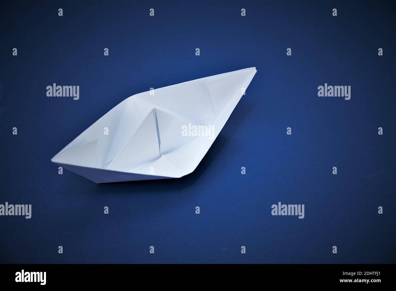paper ship isolated on white background Stock Photo - Alamy