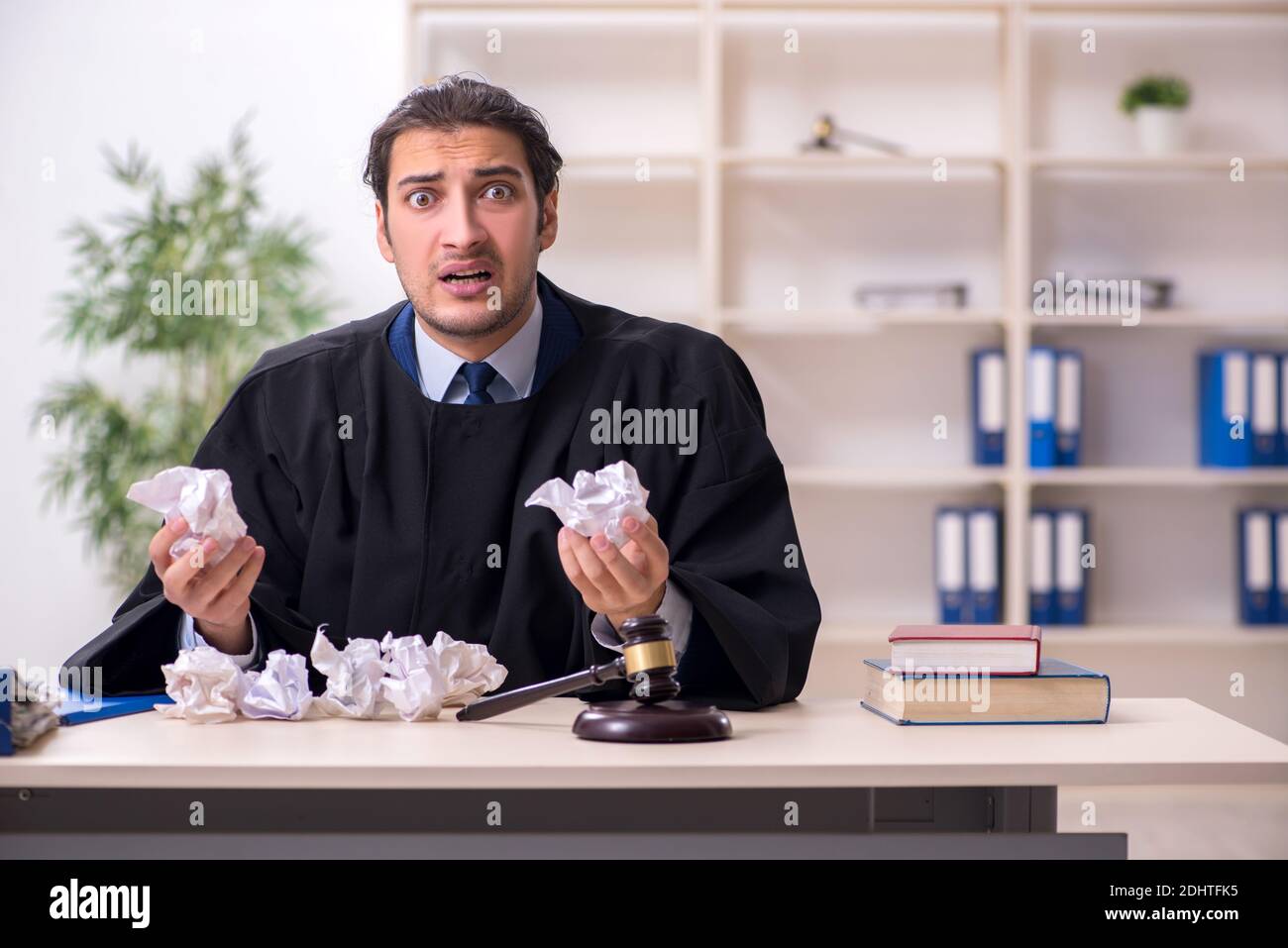 Young judge working in courthouse Stock Photo - Alamy