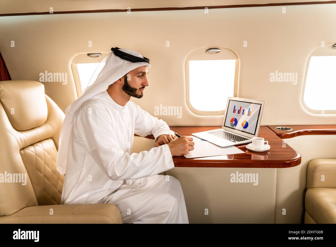 Arabic man wearing kandora in emirates style flying on exclusive ...