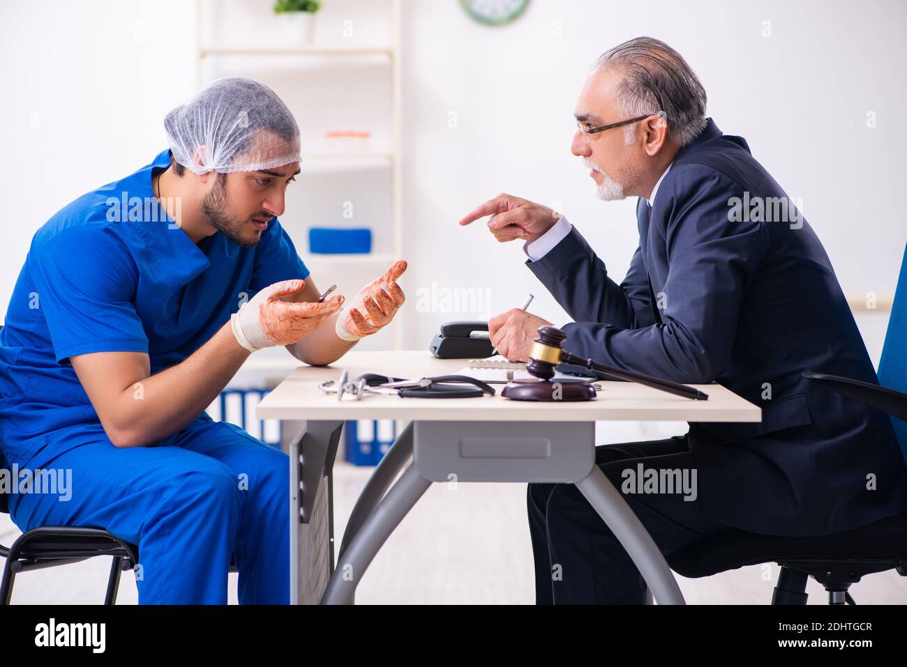 Doctor in courthouse meeting with advocate Stock Photo - Alamy