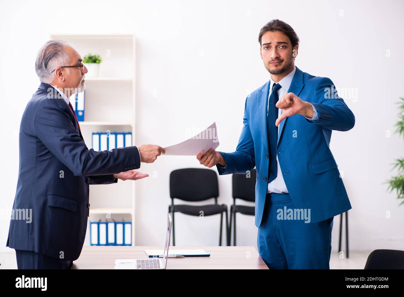 Male candidate employee meeting with old recruiter Stock Photo - Alamy