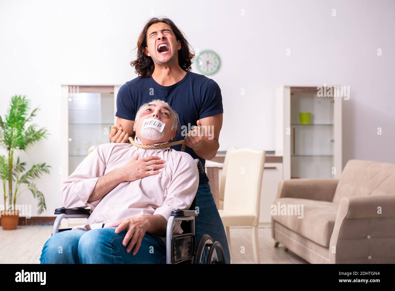 Man sitting in chair screaming hi-res stock photography and images - Alamy