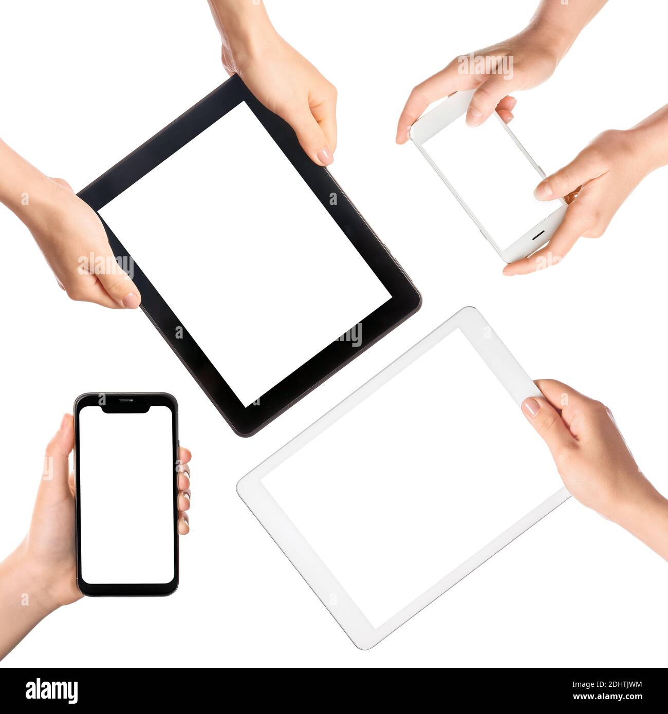 Hands with tablet computers and mobile phones with blank screens on ...