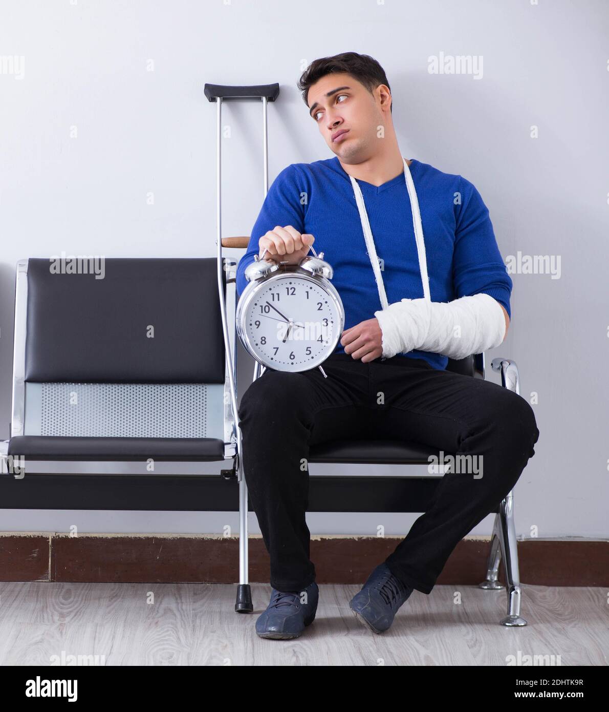 The desperate man waiting for his appointment in hospital with broke ...