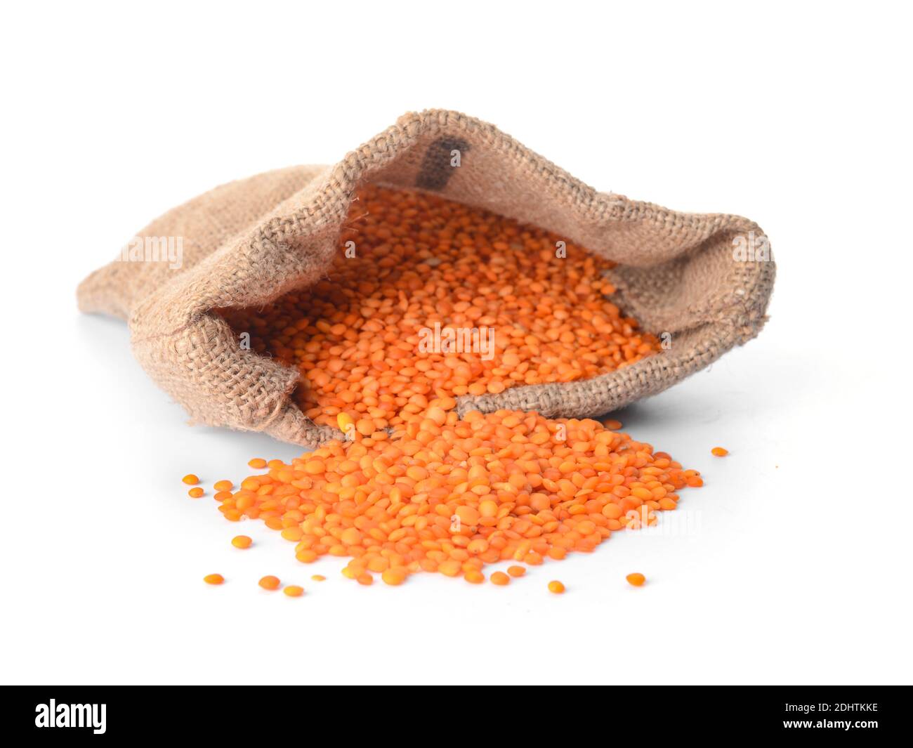 Sack with red lentils on white background Stock Photo - Alamy