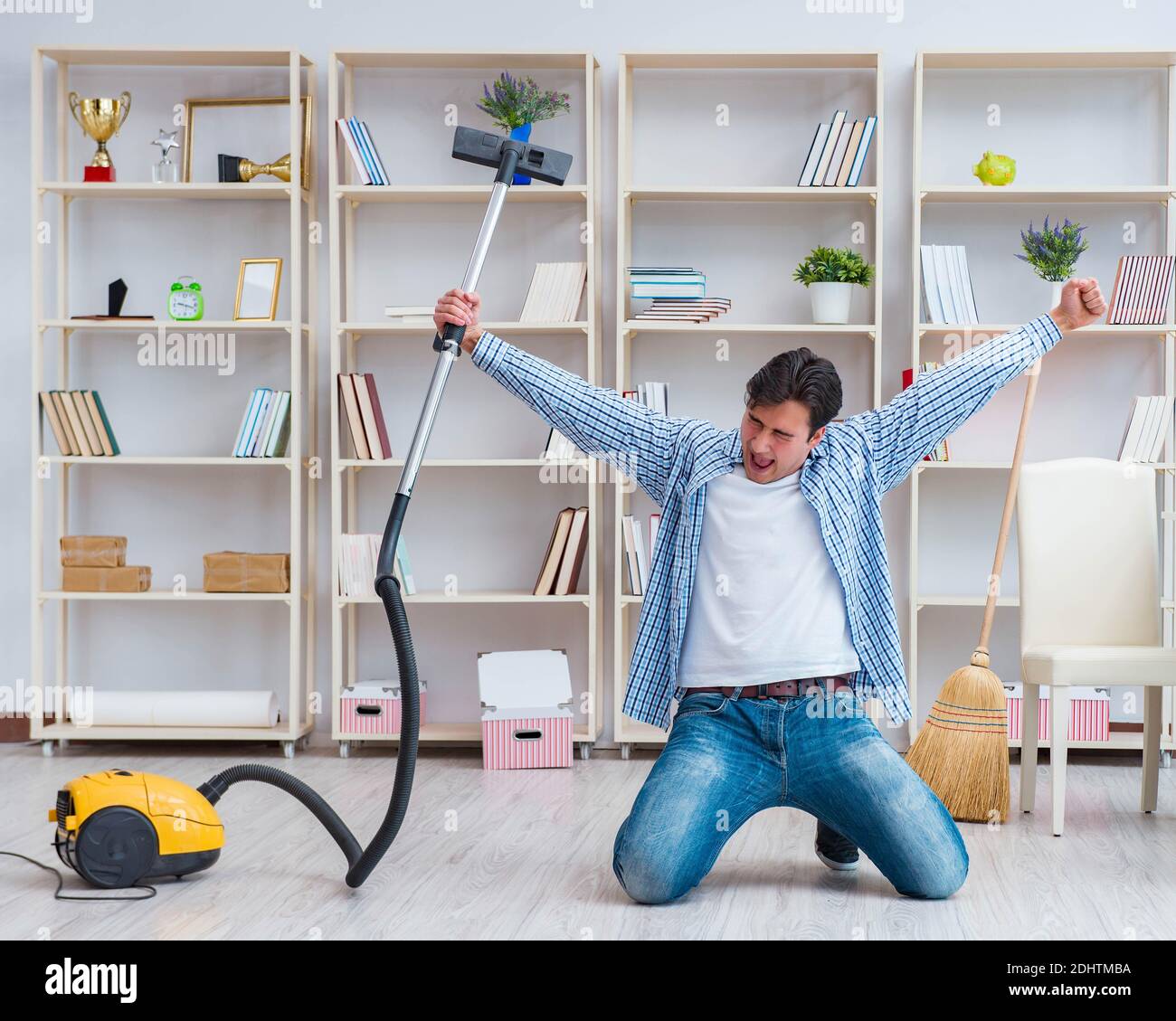 The man doing cleaning at home Stock Photo - Alamy