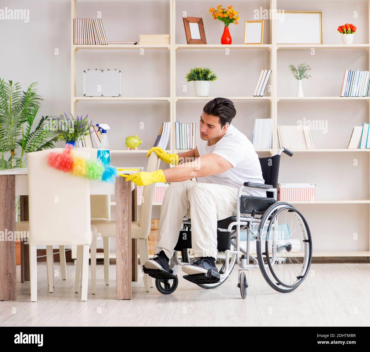 The disabled cleaner doing chores at home Stock Photo - Alamy